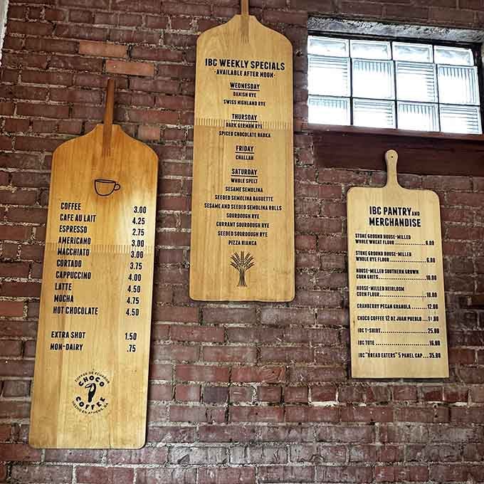 Those wooden paddle menus on the brick wall tell you everything you need to know about serious coffee and serious baking.