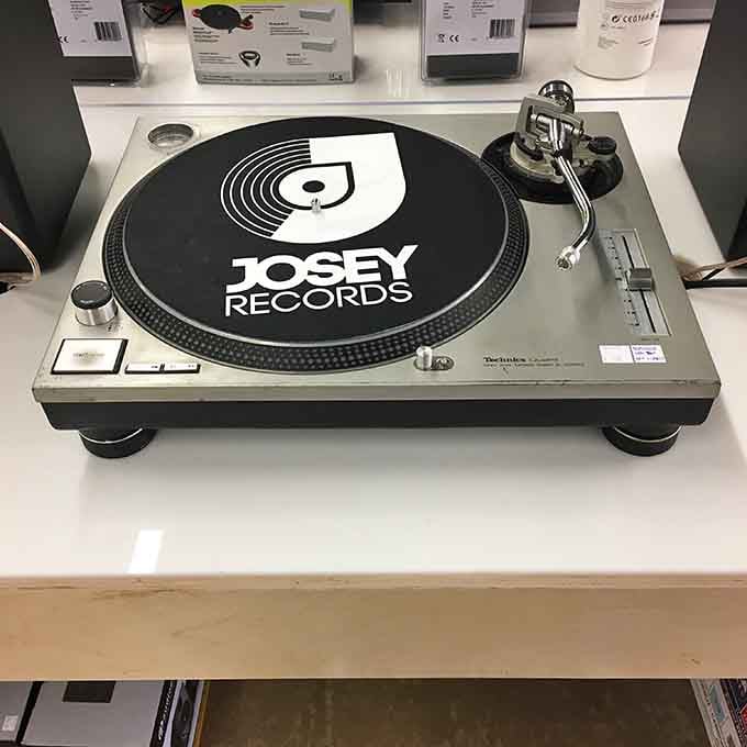 Even the turntables here sport the Josey logo, because branding matters when you're America's largest record store.