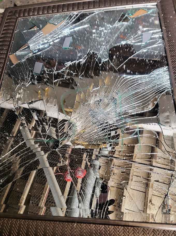 That satisfying spiderweb pattern is what happens when stress meets glass meets a well-swung baseball bat.