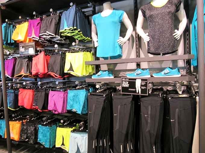 Colorful athletic wear stacked like a rainbow of motivation, ready to make you look fit even before you hit the gym.