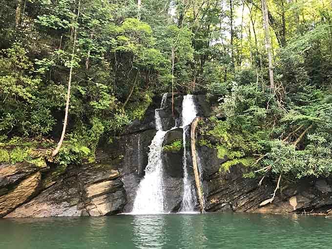 A waterfall that tumbles straight into the lake, because apparently Jocassee decided regular scenery wasn't dramatic enough.