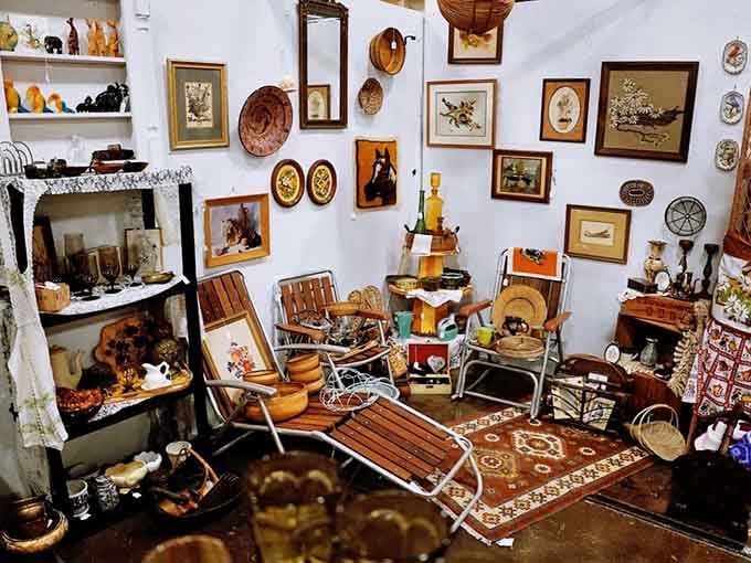When vintage frames and rustic treasures create a wall display this charming, you know someone curates with serious passion.