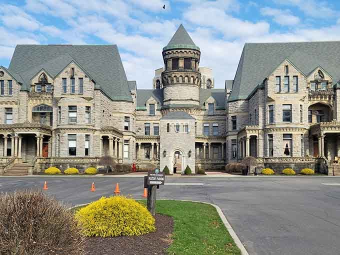The Ohio State Reformatory stands like a Gothic castle, reminding us that even prisons can have better bones than modern condos.