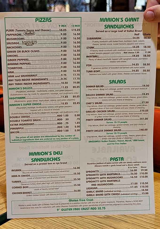 This menu is a masterclass in simplicity: no fancy descriptions needed when the pizza speaks for itself perfectly.