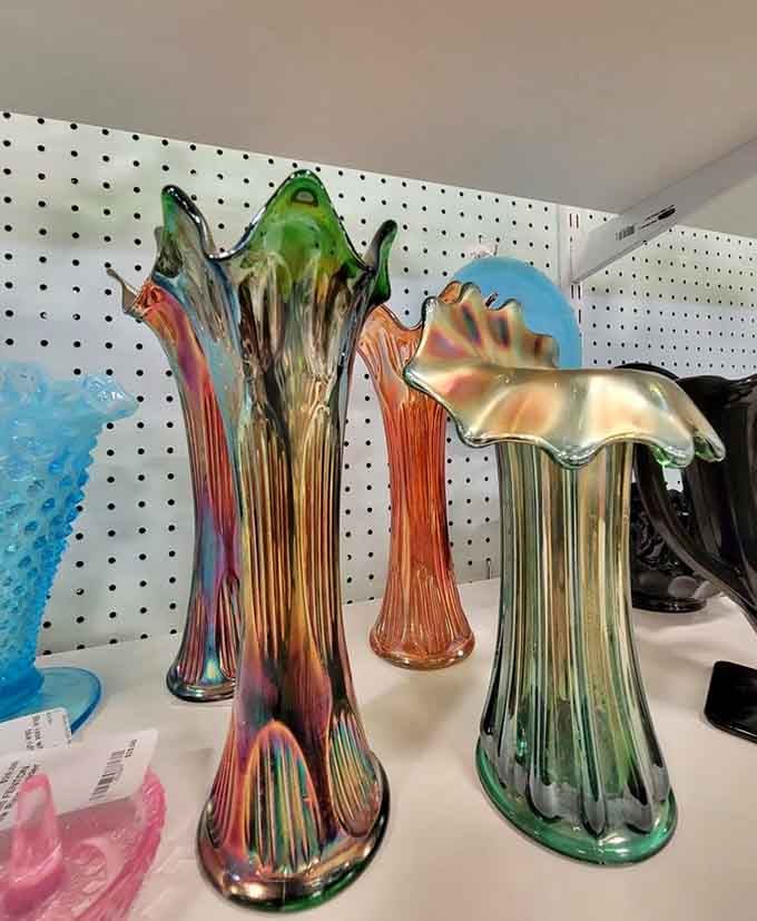 Carnival glass vases that shimmer with more colors than your grandmother's favorite soap opera had plot twists.
