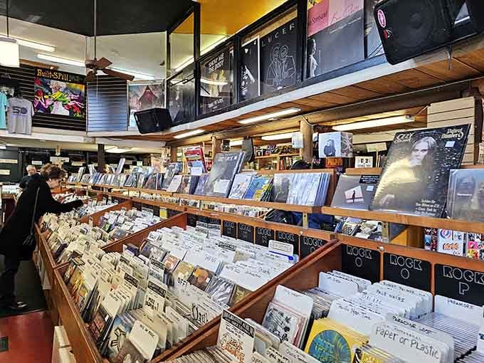 Those wooden display racks hold more treasures than King Tut's tomb, and infinitely better soundtrack options for your life.