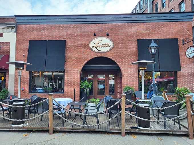 Lucia's welcomes you with that classic brick-and-shutters charm that makes every meal feel like a special occasion worth celebrating.