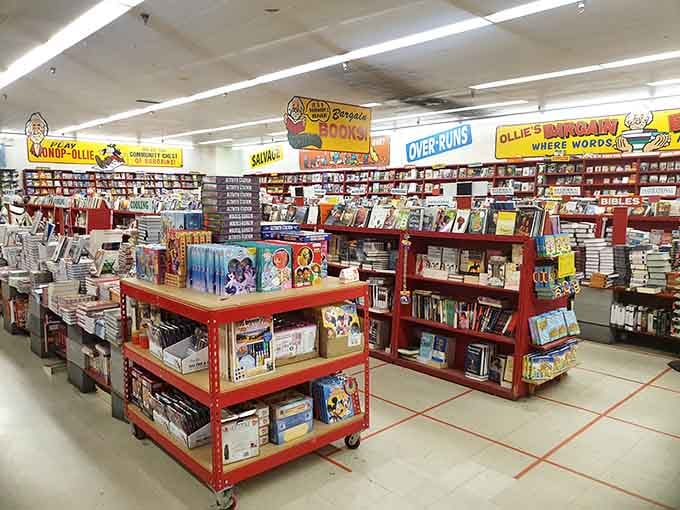 Books stacked high on red shelves, waiting to build your personal library for less than a fancy coffee costs.