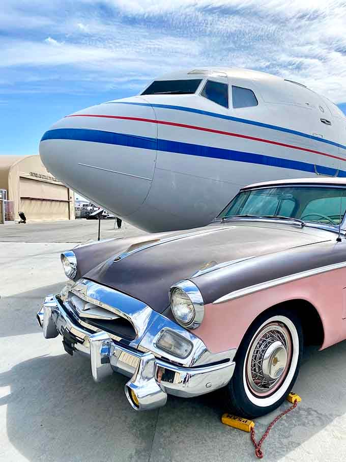 When vintage cars meet vintage aircraft, it's like the world's coolest time capsule decided to throw a party.