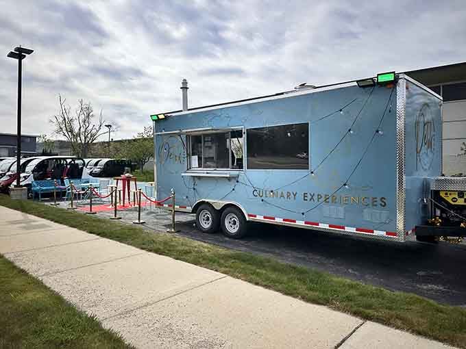 Food trucks have come a long way from mystery meat, and this sleek blue beauty proves culinary excellence doesn't need four walls.