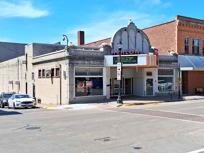 The Avalon Cinema stands proud, proving that not everything worth watching requires a streaming subscription and three password resets.