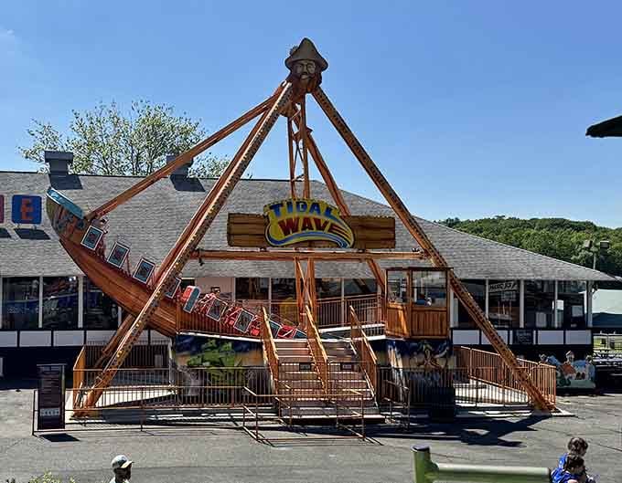 The Tidal Wave ride looms overhead, promising the kind of thrills that make you reconsider your choices.