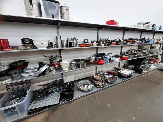 Someone's abandoned kitchen arsenal awaits its next culinary adventure on these well-organized shelves.