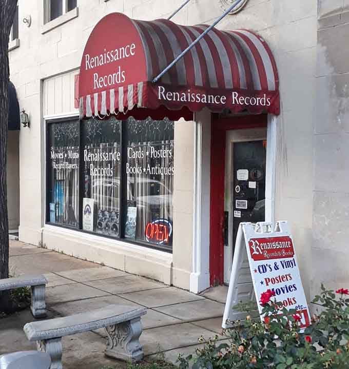 The striped awning promises what's inside: a delightfully old-school experience that modern life forgot to erase from existence.