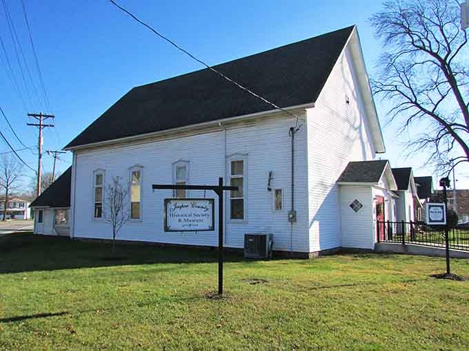 The Jasper County Historical Society preserves local heritage in this charming white building that welcomes curious visitors.