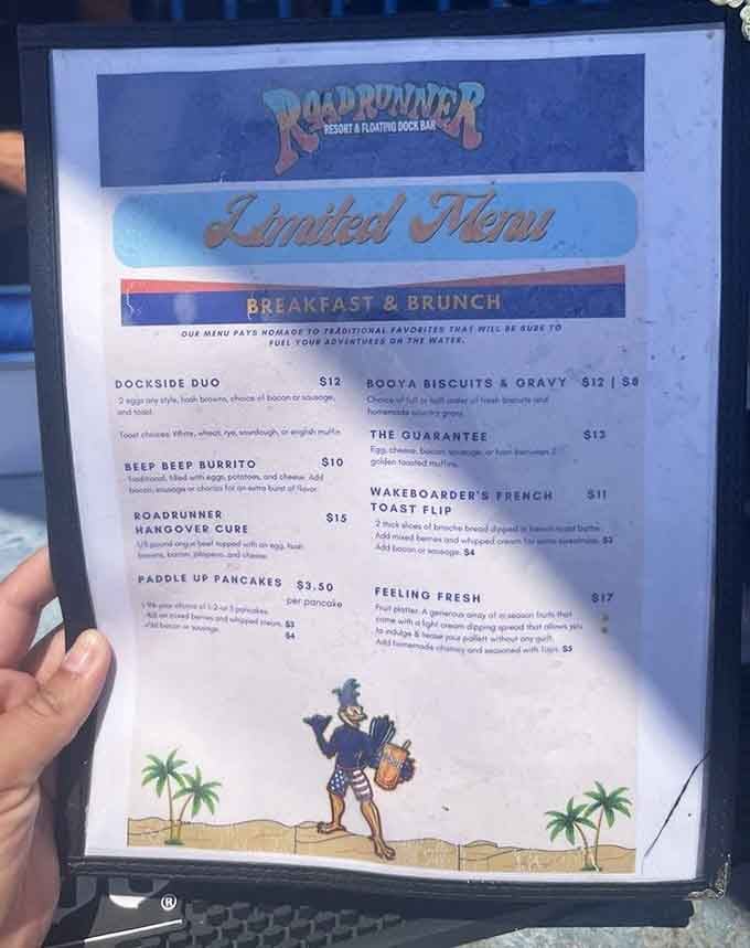 Menu items with names like "Roadrunner Hangover Cure" prove someone here understands the river lifestyle perfectly.
