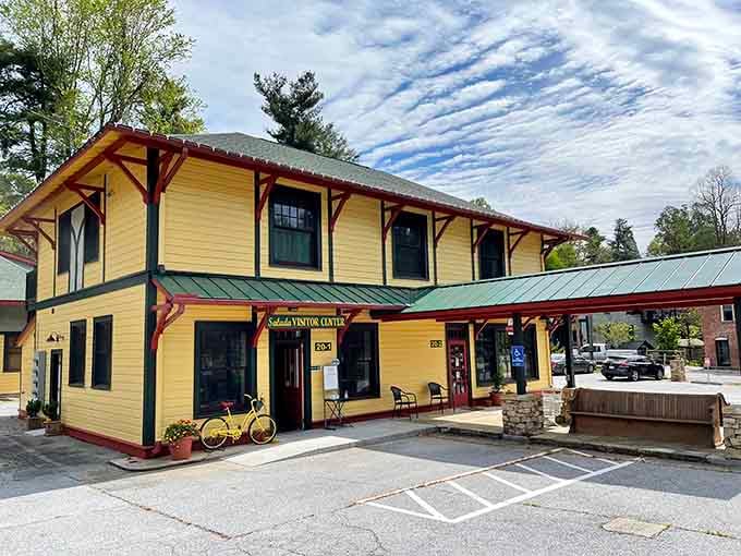The cheerful yellow depot now welcomes visitors instead of weary travelers, though the stories inside are equally captivating.