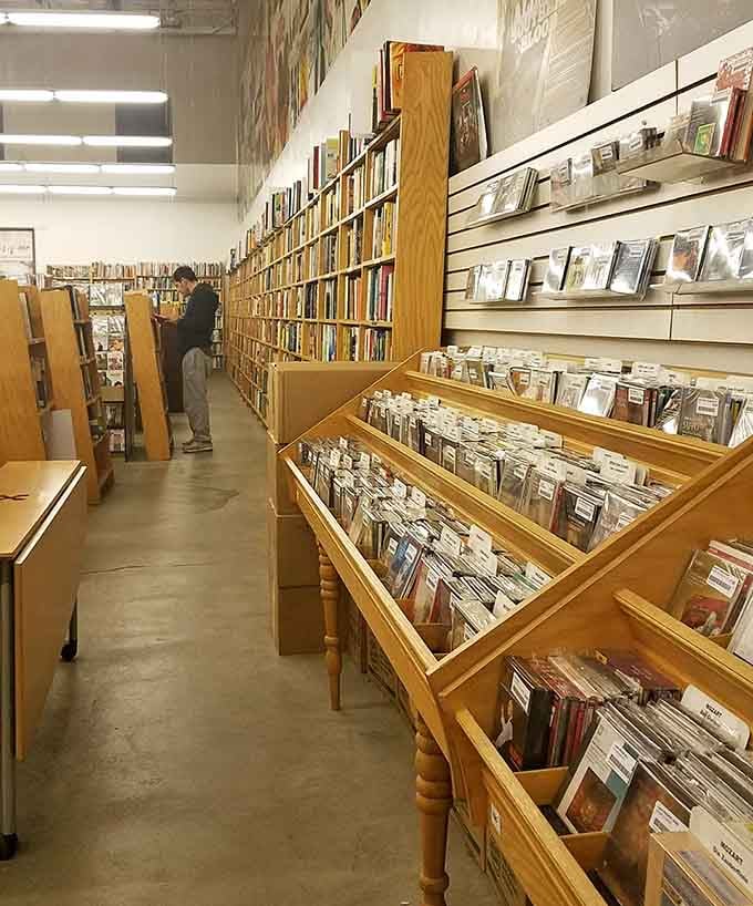 Wooden bins stretch endlessly, each one a potential treasure chest for the dedicated vinyl hunter.