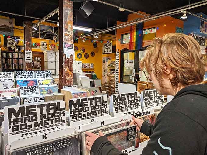 When browsing becomes a full-contact sport, and every flip could reveal your next musical obsession.