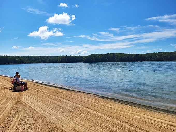 Real sand stretches before you, proving that great beaches don't require an ocean zip code.