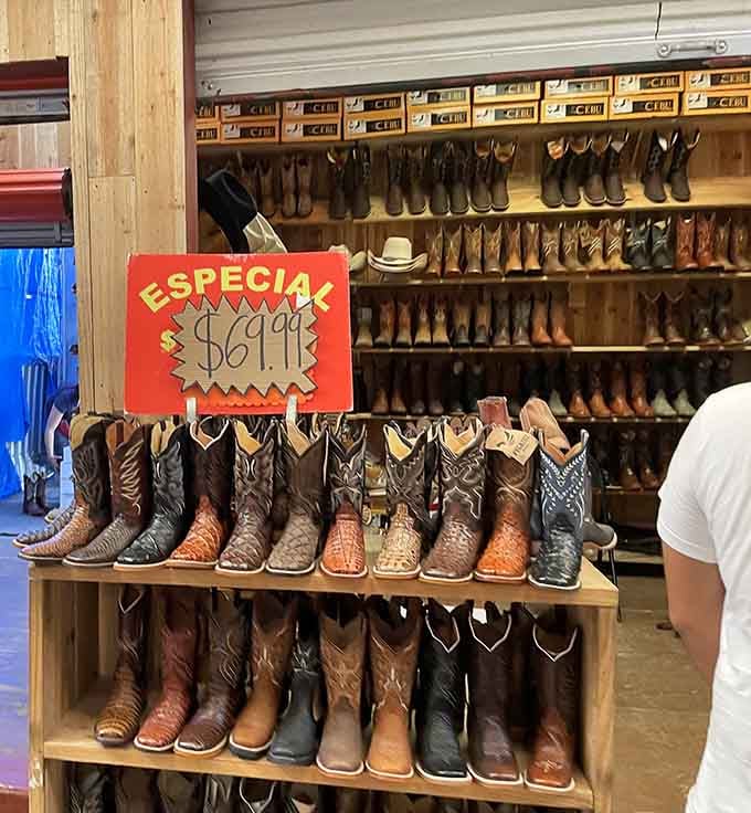 Rows of handcrafted cowboy boots stand at attention like leather soldiers, each pair ready for its two-stepping destiny.