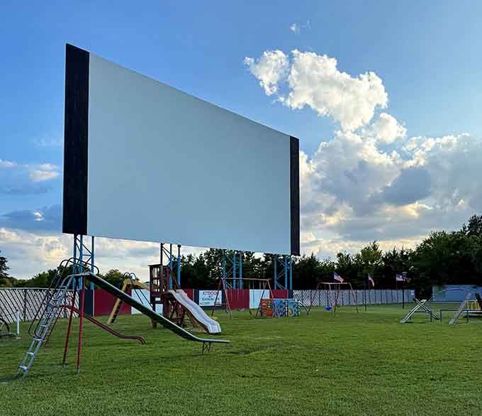 Let the kids burn energy on the playground before showtime, genius parenting strategy included free.