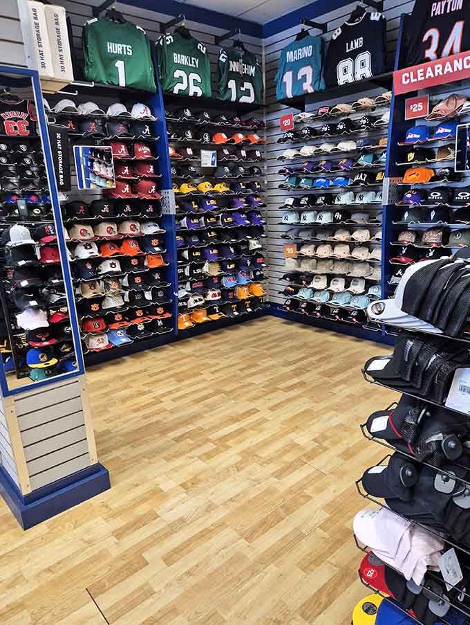 Cap collectors, this wall of dreams has more team spirit than a tailgate party and a pep rally combined.