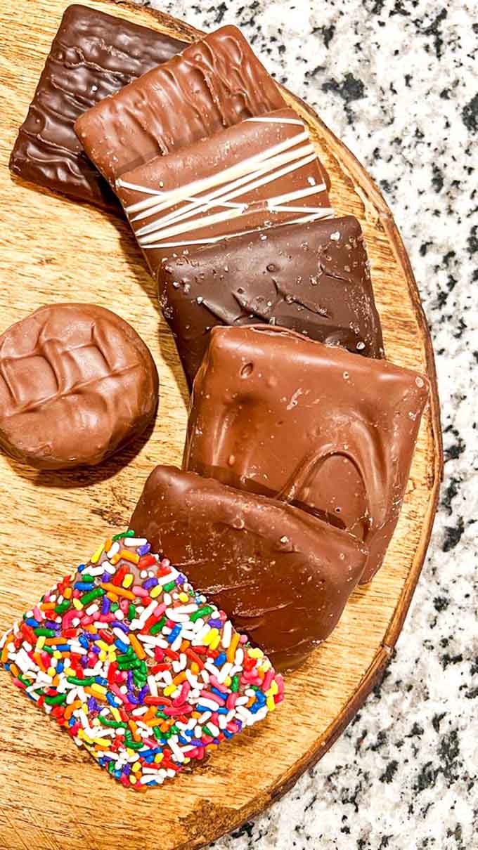 Handcrafted chocolates arranged like edible art, each piece a small masterpiece waiting to make someone's day absolutely perfect.