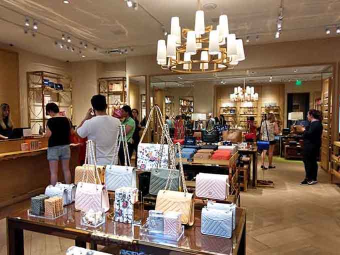 Luxury handbags at outlet prices prove you can have champagne taste on a beer budget, finally.