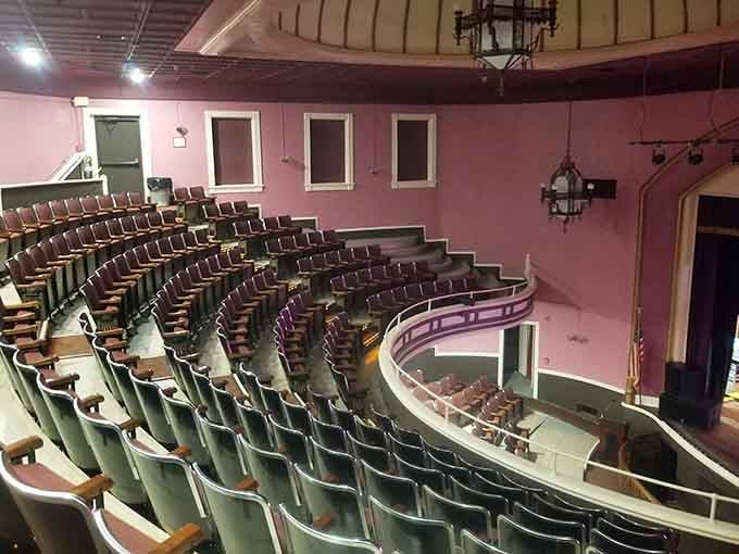 The balcony curves like a welcoming embrace, proving that good sightlines never go out of style.