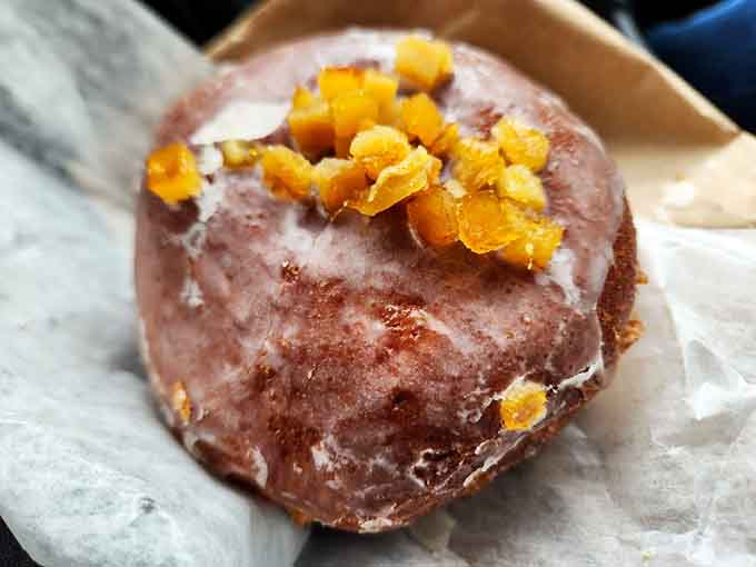This pączek topped with candied orange peel proves Poland has been doing doughnuts right all along.
