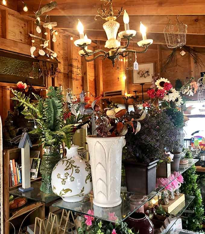 Chandeliers and ceramic elephants share shelf space in this delightfully eclectic display of home decor possibilities.