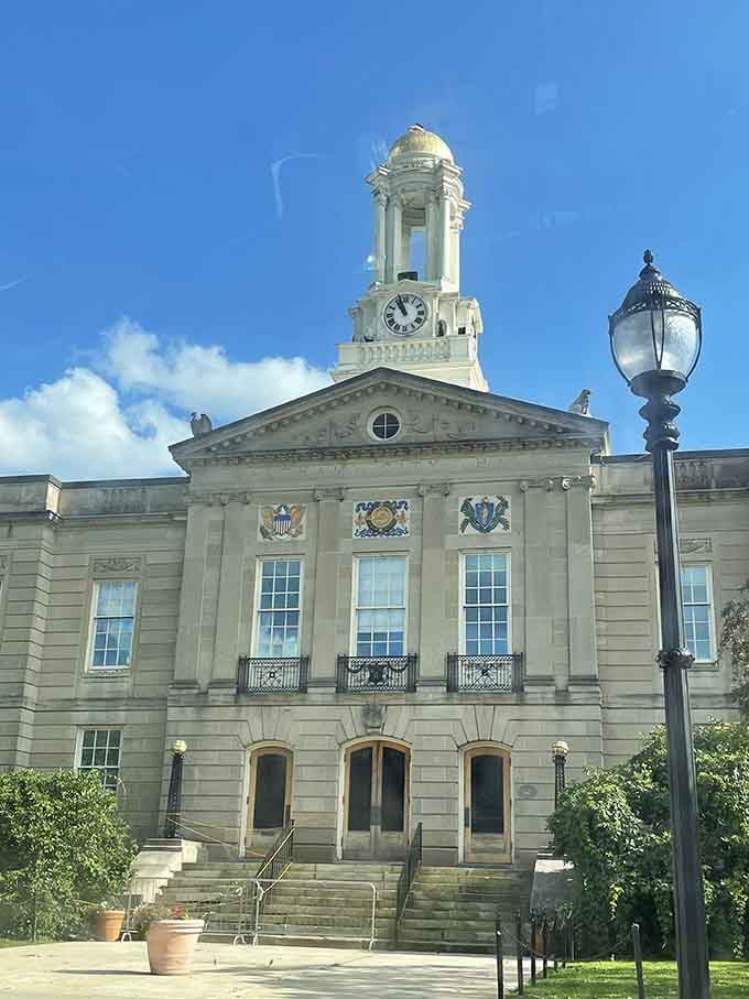 City Hall stands proud with that clock tower keeping perfect time, just like those famous Waltham watches.