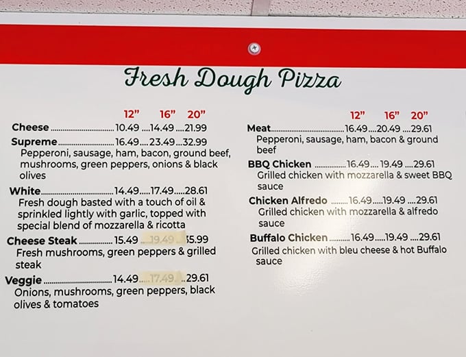 Fresh dough pizza in twelve varieties, from Supreme to Buffalo Chicken, all listed with pride on the wall.