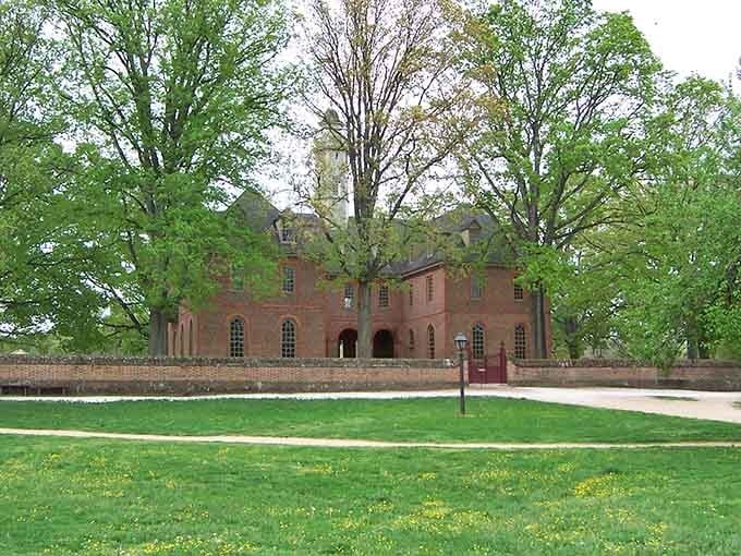 Georgian brick architecture surrounded by spring greenery, where history majors and garden enthusiasts finally find common ground together.