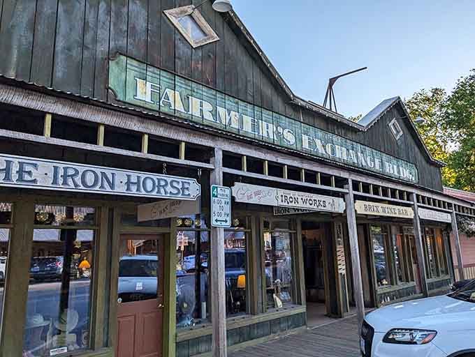 The weathered signage on this historic building whispers stories of frontier commerce, minus the actual tumbleweeds and gunfights.