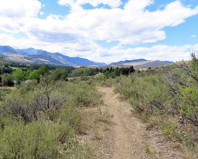 This trailhead promises the kind of wide-open valley views that make your camera roll very, very happy.