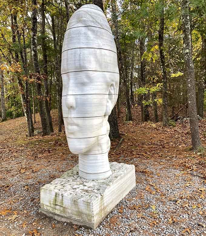 This wrapped marble head gives new meaning to "keeping your thoughts together" in the woods.