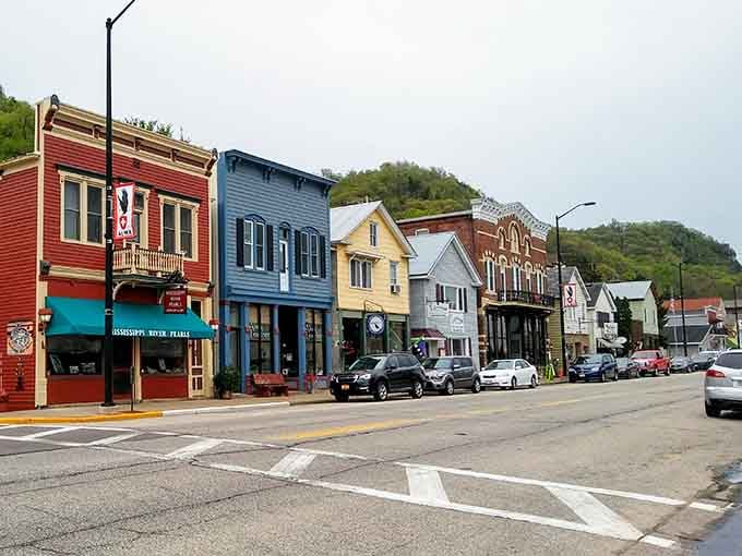 These colorful storefronts lined up like a rainbow prove that small towns don't need to be boring to be beautiful.