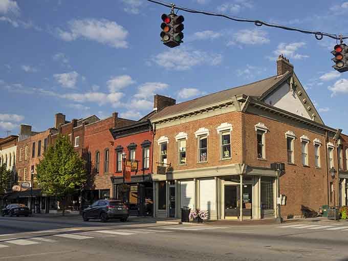 Bardstown's corner buildings catch the afternoon light, their brick facades glowing with warmth and welcome.
