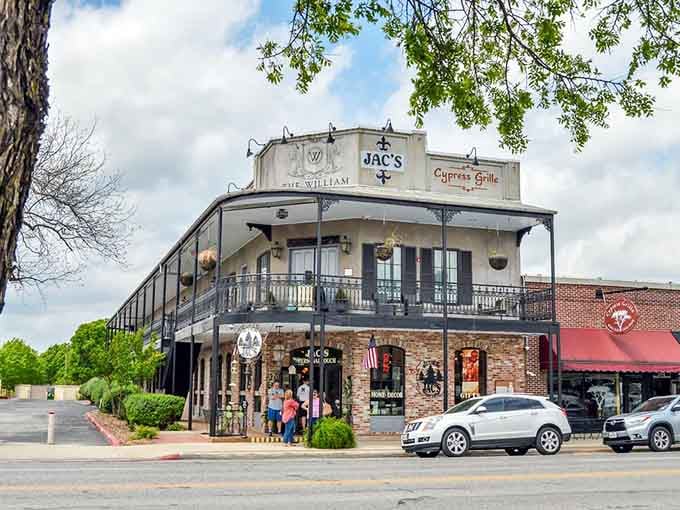 That corner building with the wraparound balcony looks ready to host a celebration any minute now.