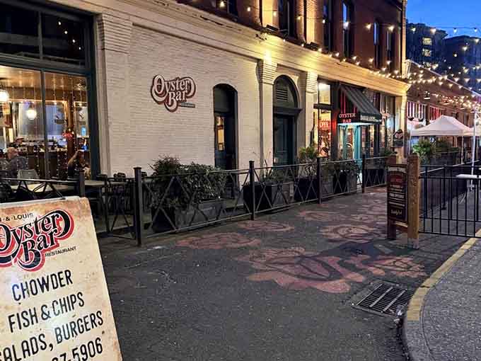 Evening lights twinkle along this historic Portland street where oysters have been shucked for over a century.