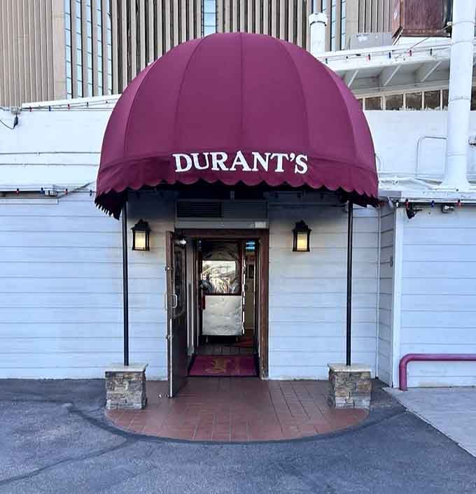 That burgundy awning marks the entrance to a Phoenix institution serving steaks since the Eisenhower era.