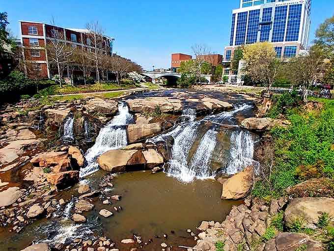 Downtown waterfalls prove that cities and nature can share the same address without arguing about the thermostat.