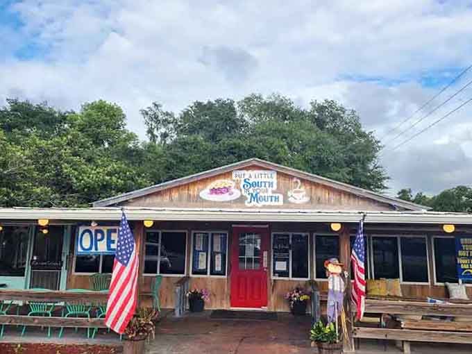 Those American flags and rustic wood siding tell you everything: honest food, friendly folks, no pretense required.