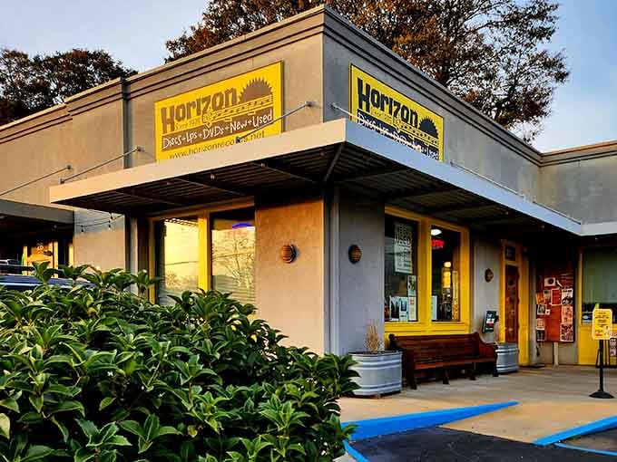 Golden hour light bathes this inviting storefront where vinyl dreams come true and music memories are made fresh.