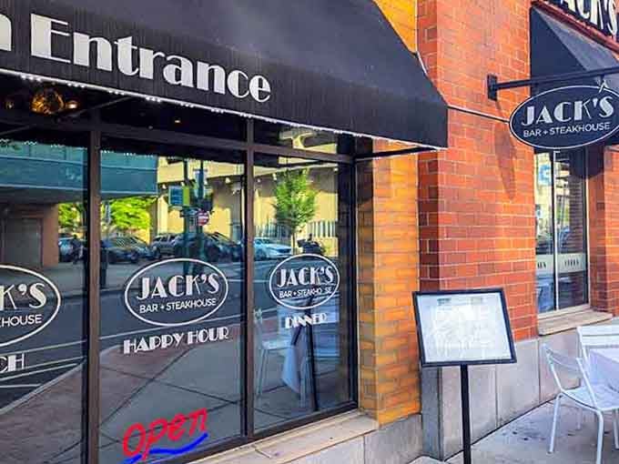 Those glass doors and "Happy Hour" signs mean serious business when it comes to perfectly grilled steaks and cold drinks.