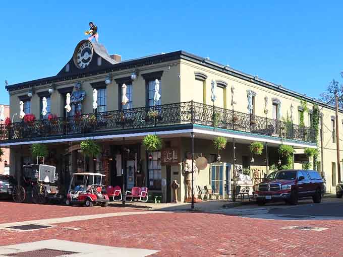 That gorgeous wrought-iron balcony and corner clock tower could make even Scarlett O'Hara feel right at home here.