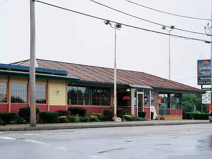 That striped metal roof and cozy setup says "local favorite" louder than any billboard ever could.
