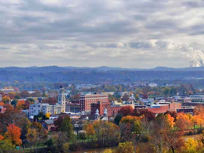 From this hilltop view, the town spreads out like a patchwork quilt stitched together with church steeples and memories.